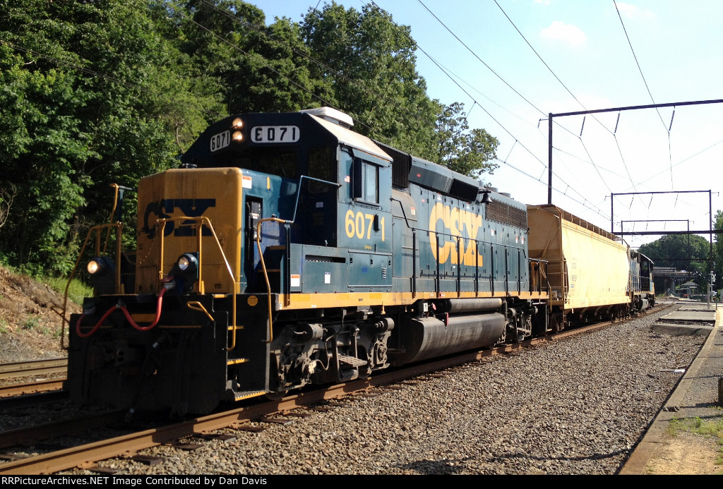 CSX GP40-2 6071 leads C770-29 up track one